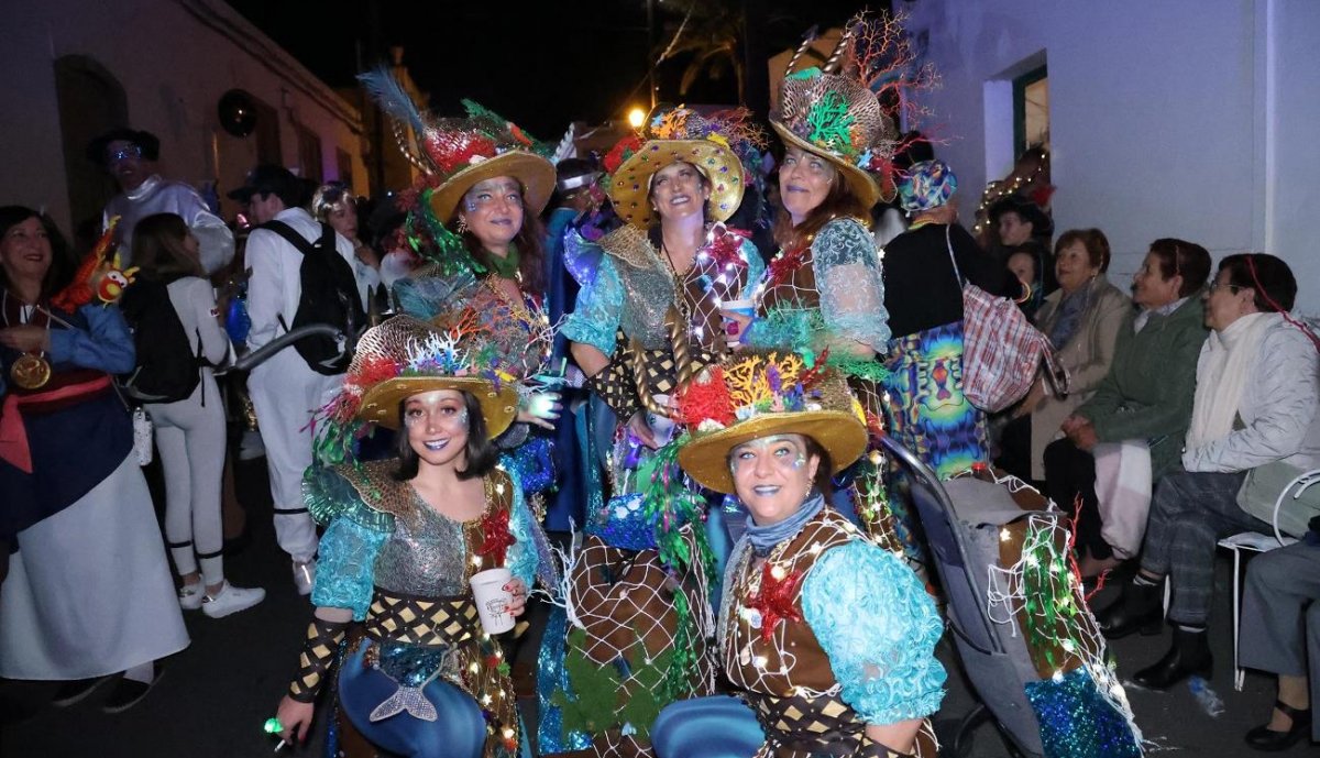 Hundreds of masked revelers enjoy the Haría Carnival Parade